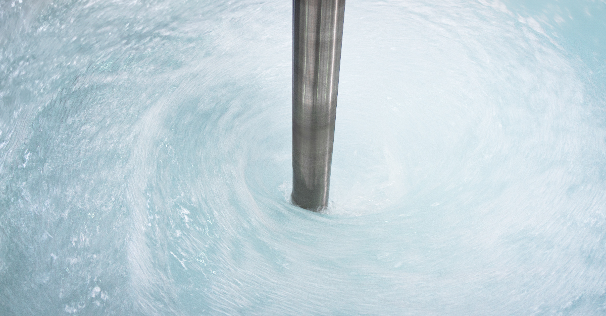 What is an industrial agitator and its components?